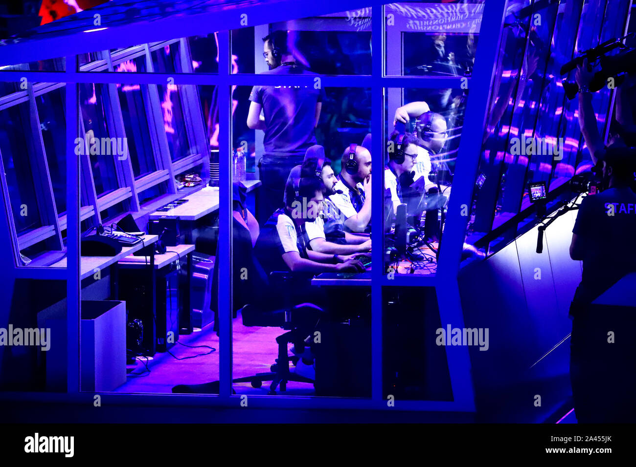 Players compete in the Dota 2 International game during the TI9 grand ...
