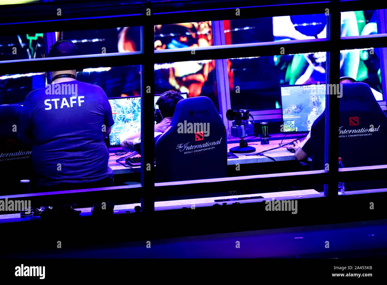 Players compete in the Dota 2 International game during the TI9 grand ...