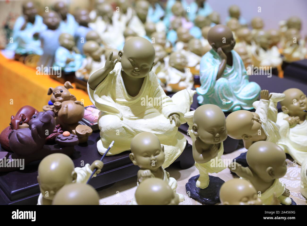 Cute sculptures featuring shape of monks are displayed during the 7th ...