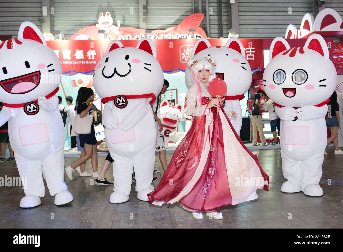 A Chinese showgirl poses during the 17th China Digital Entertainment ...