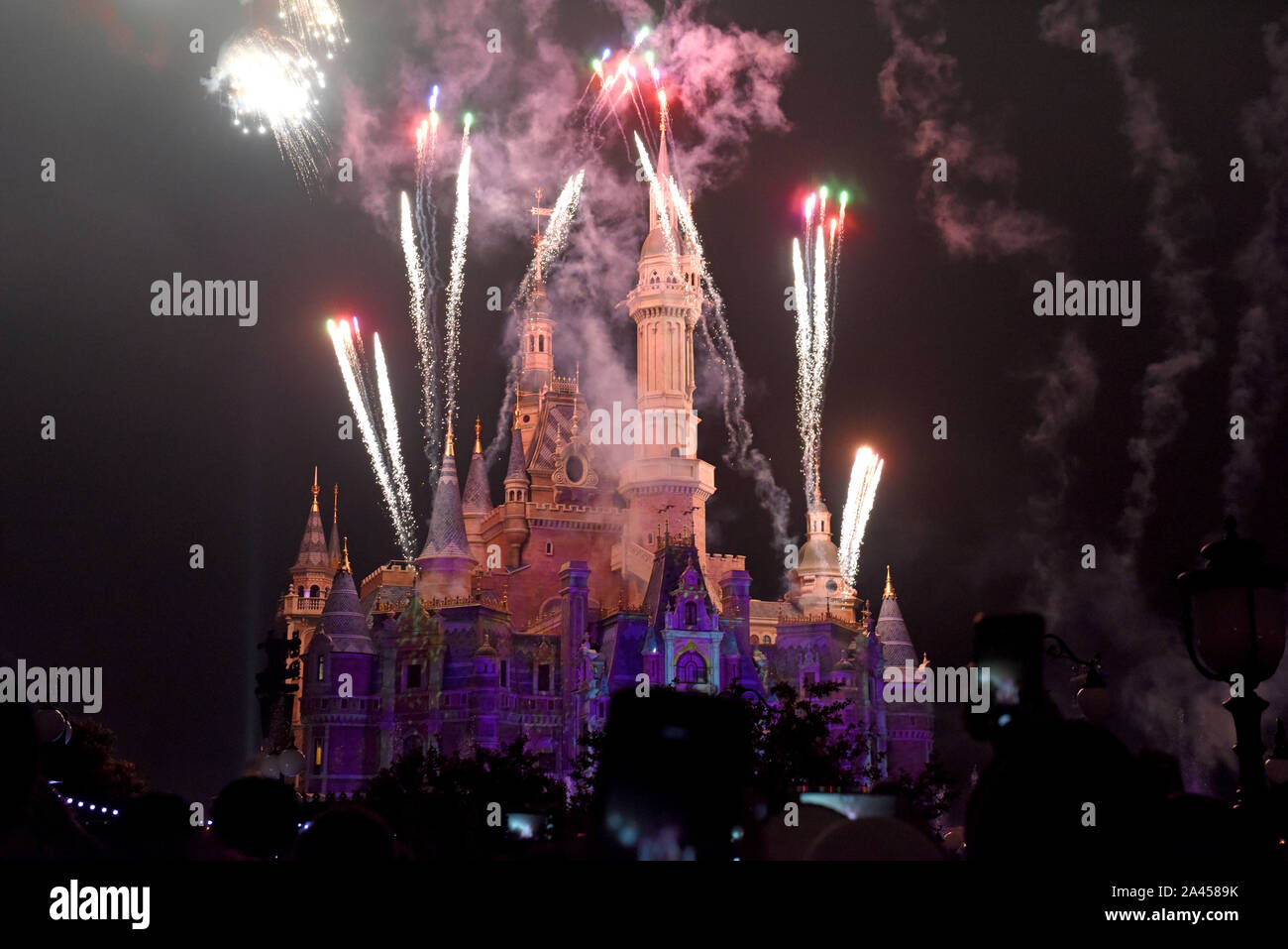 --FILE--Fireworks explode over the Disney Castle in the Shanghai ...