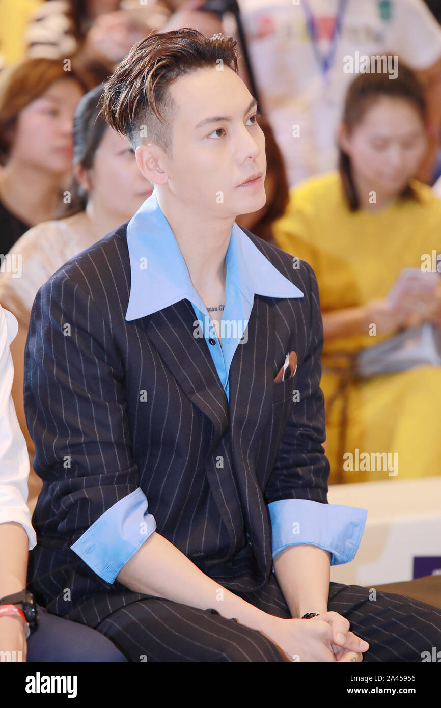 Hong Kong singer and actor William Chan attends a promotional event for ...