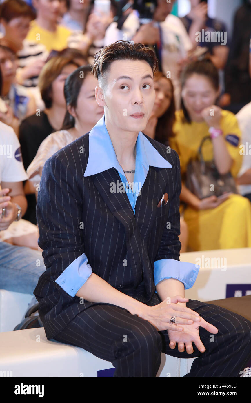 Hong Kong singer and actor William Chan attends a promotional event for ...