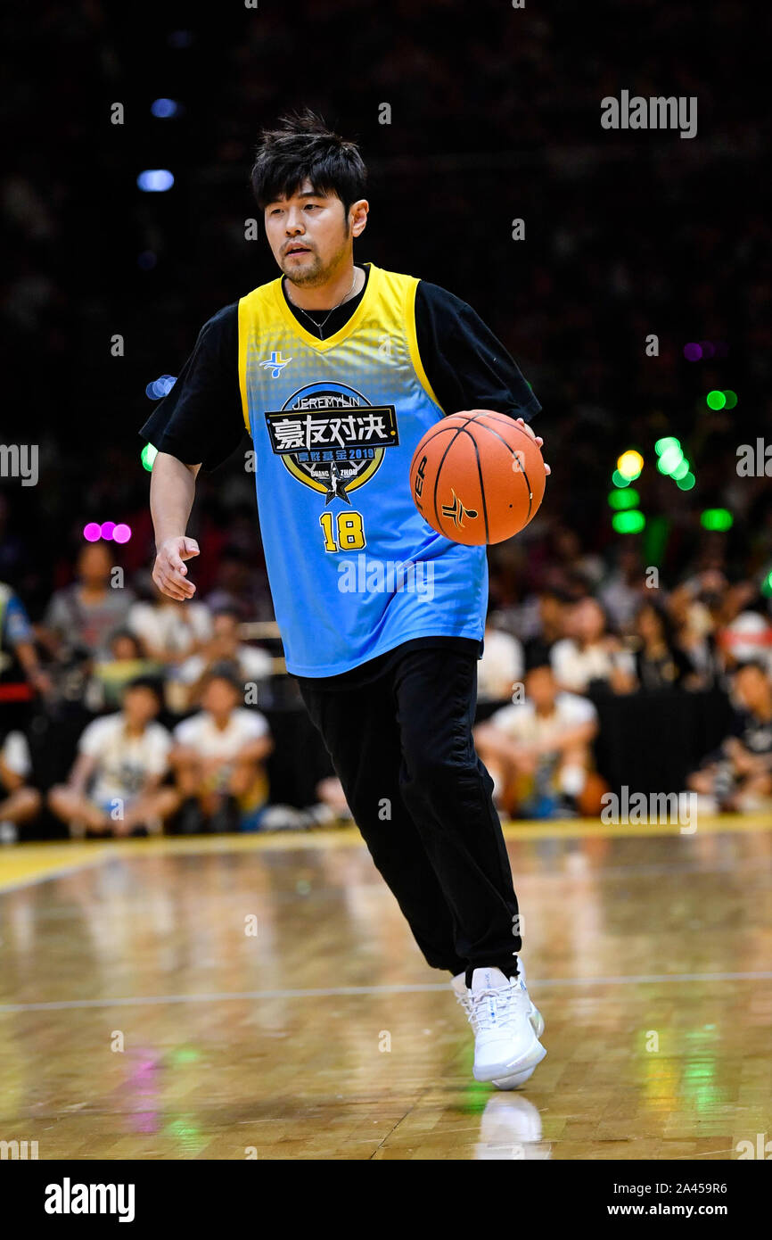 Taiwanese singer and actor Jay Chou takes part in the 3rd Jeremy Lin All Star charity basketball ...