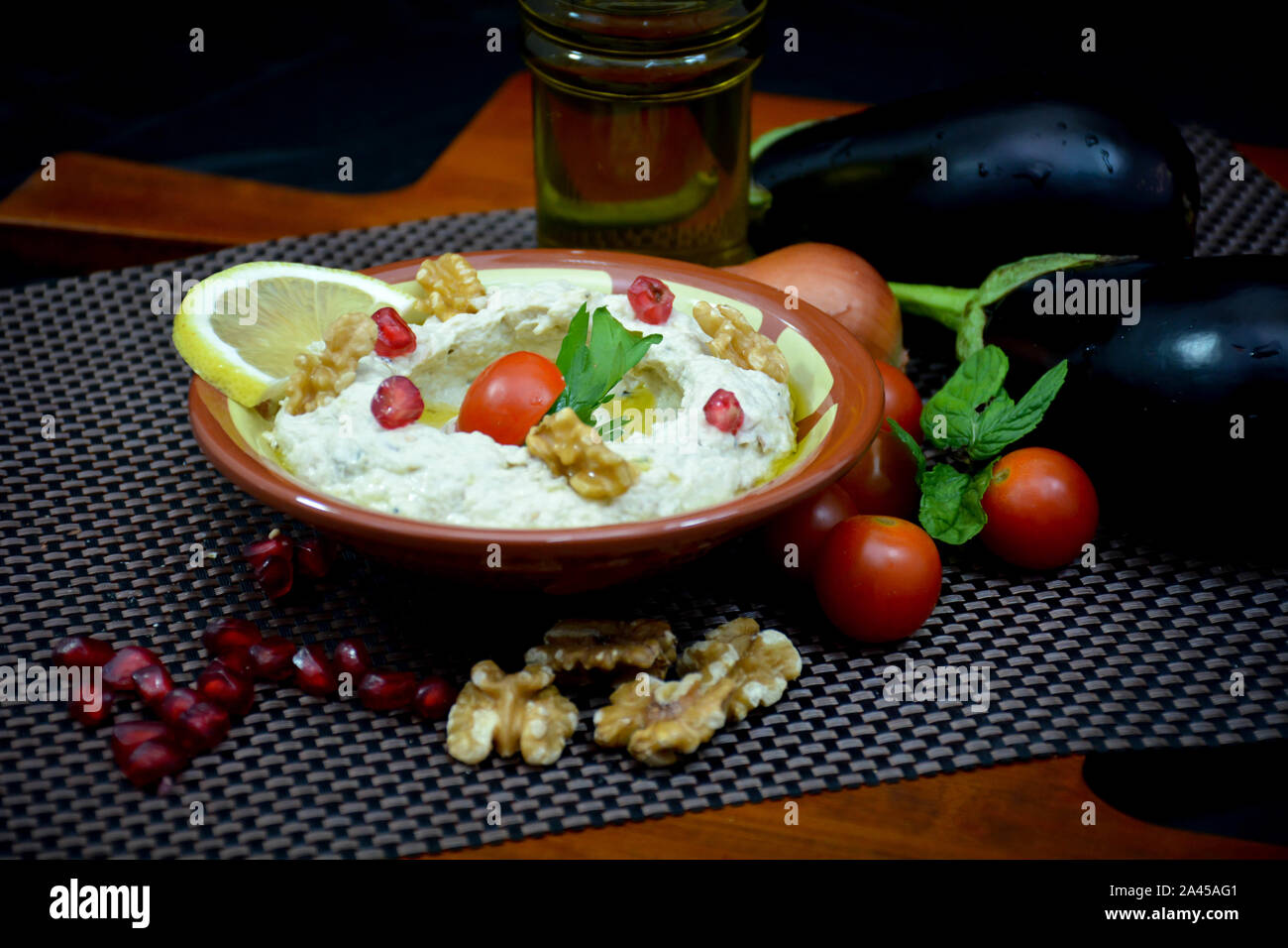 Plate of traditional eastern MUTABBAL. Arabic traditional food . Middle ...