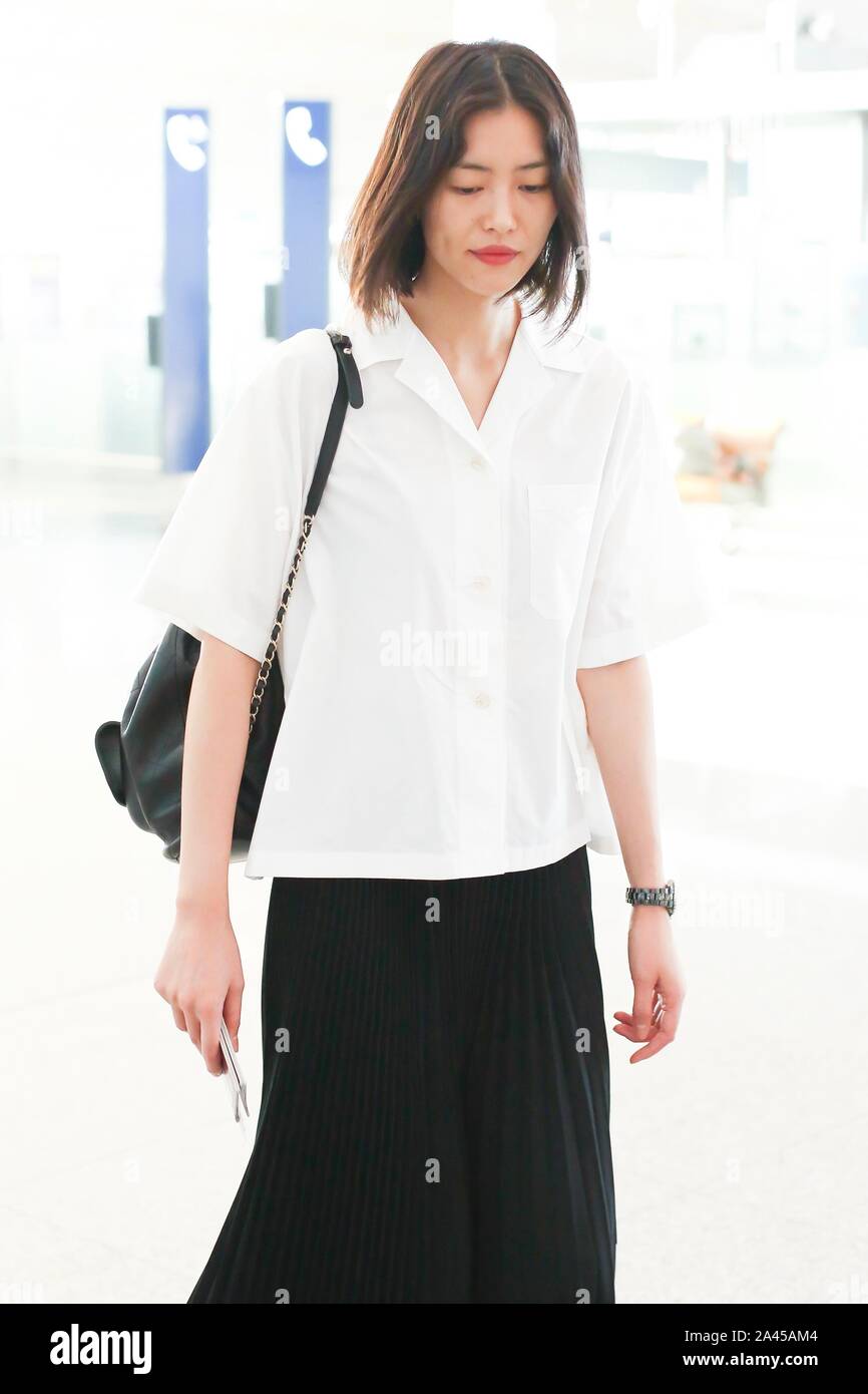 Chinese supermodel Liu Wen arrives at the Beijing Capital International ...