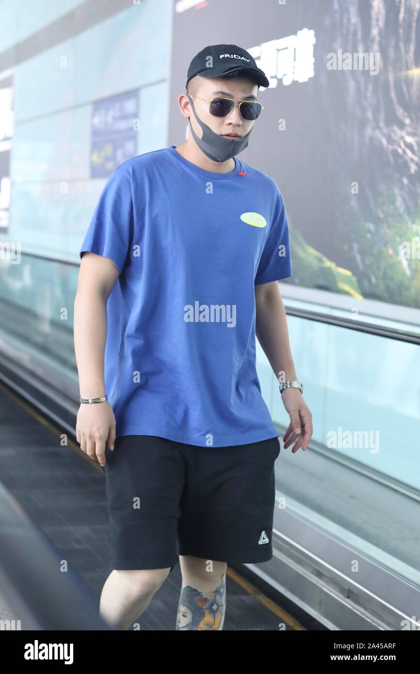 Chinese actor and singer Ohu Ou Hao arrives at the Beijing Capital ...