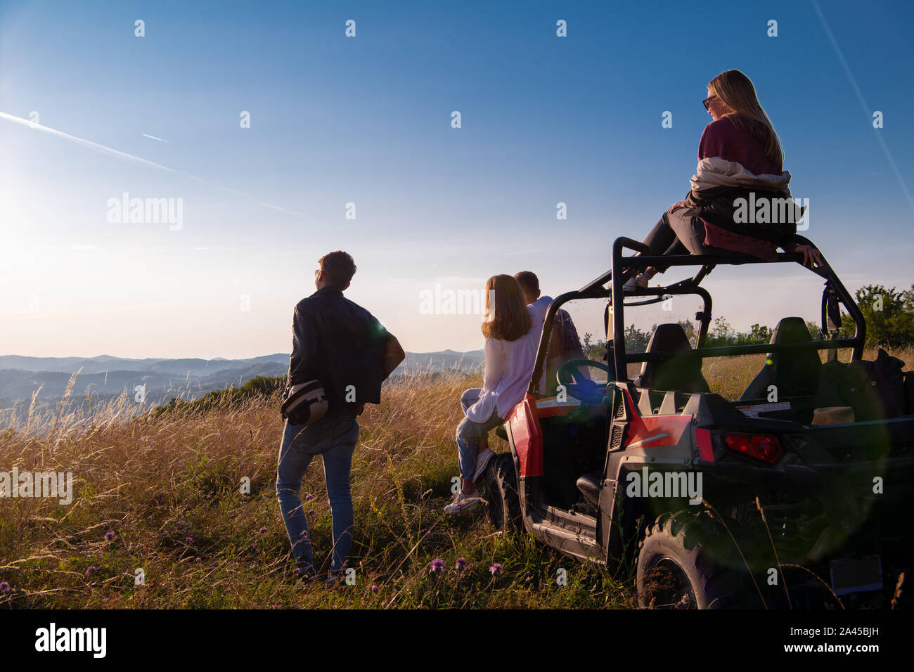 portrait of group young happy people enjoying beautiful sunny day while ...