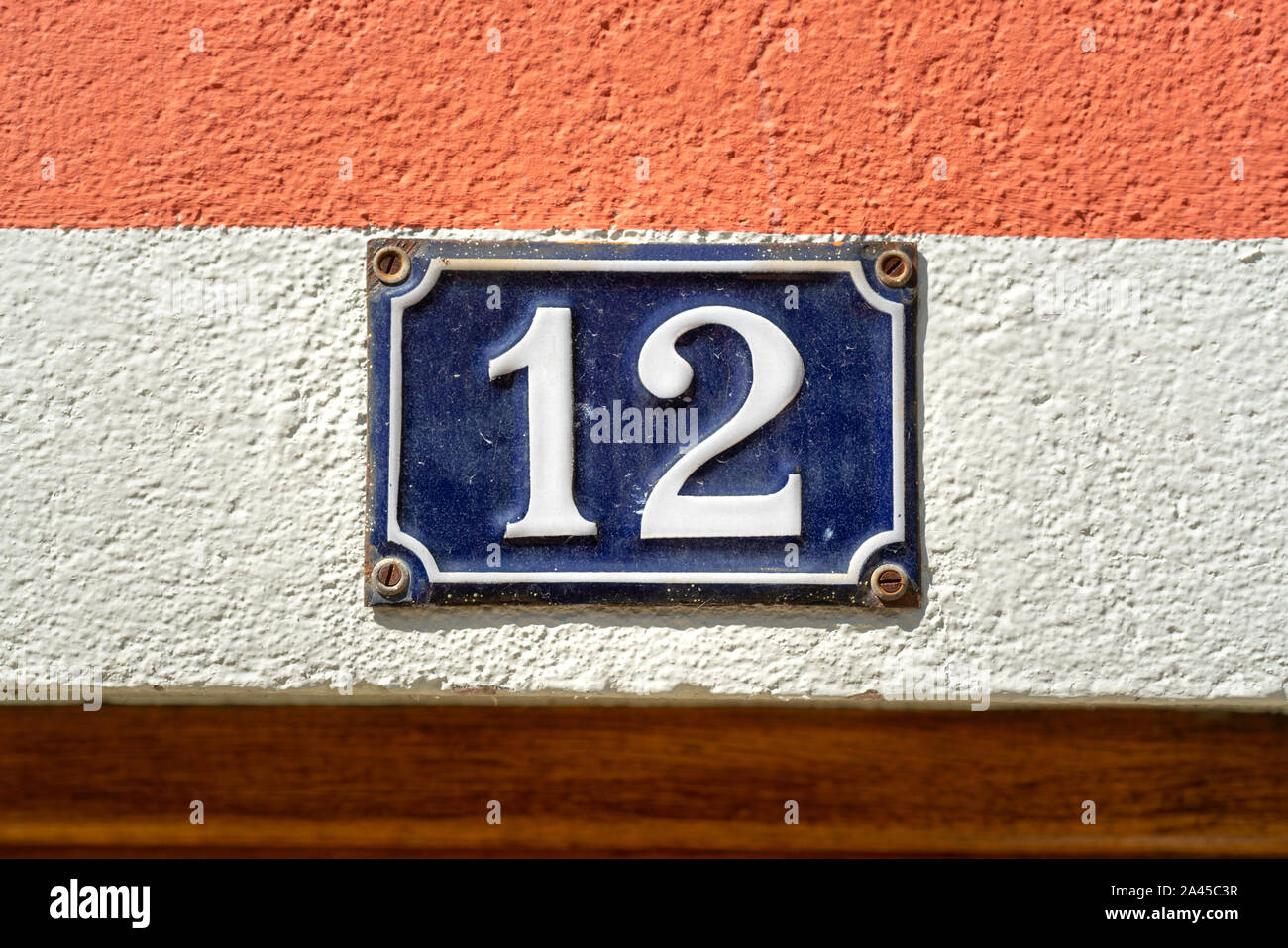 Enameled house number twelve Stock Photo - Alamy