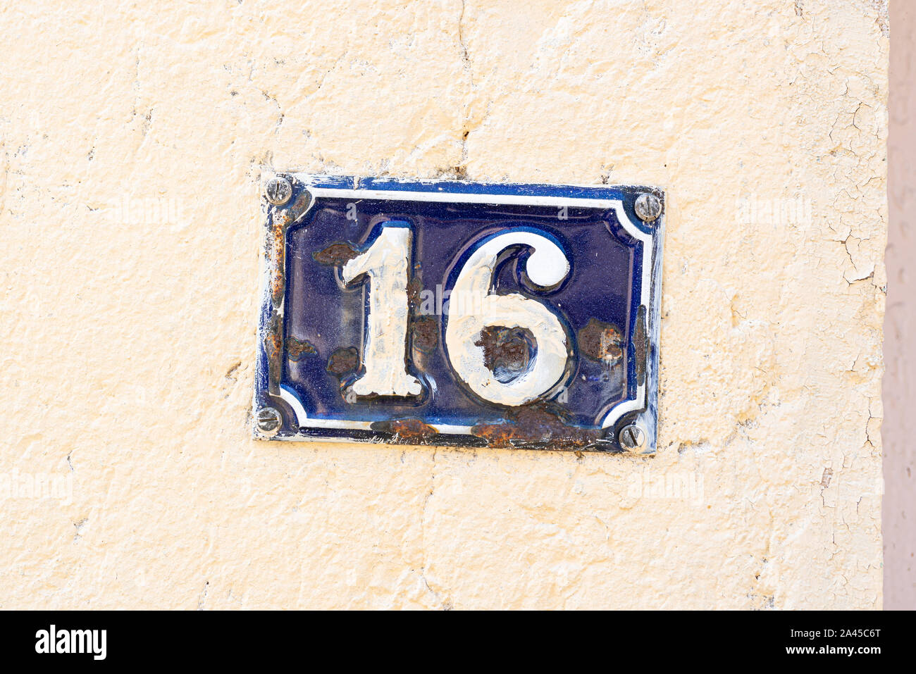 Enameled house number sixteen (16 Stock Photo - Alamy