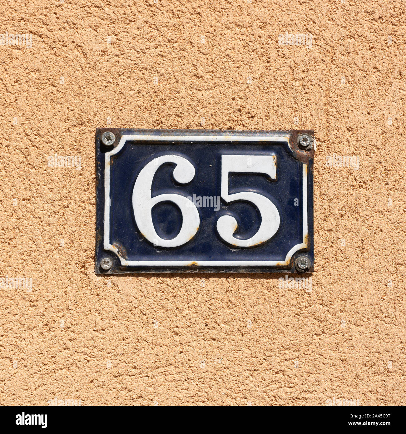 Enameled house number sixty five (65 Stock Photo - Alamy