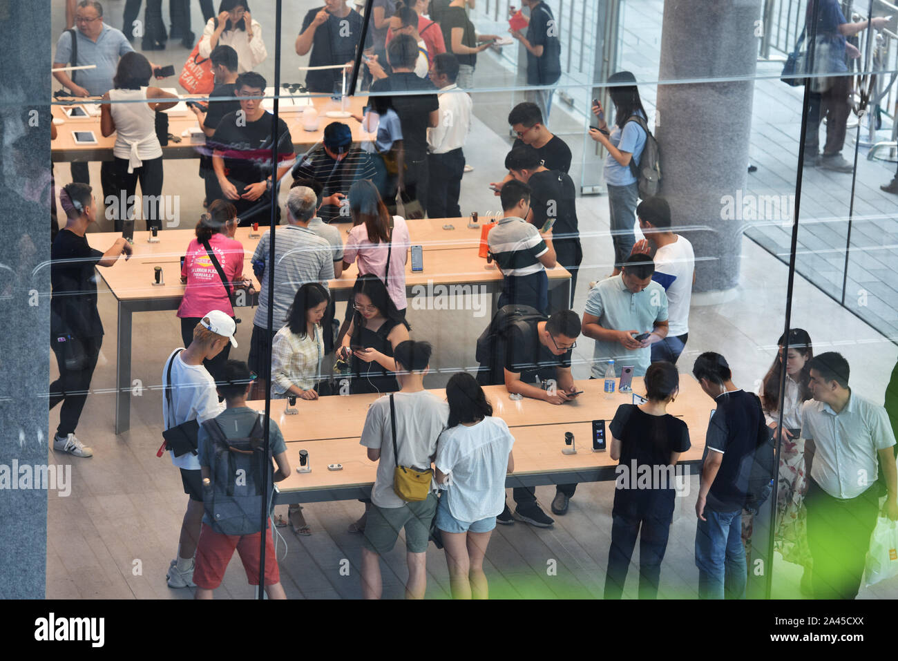 Consumers flock to get inside and experience the first Huawei's global ...