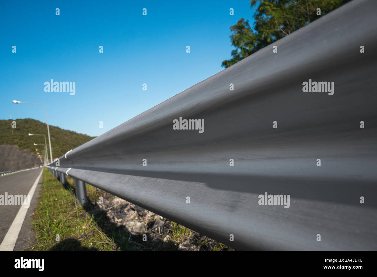 Safety steel barrier on freeway bridge designed to prevent the exit of ...