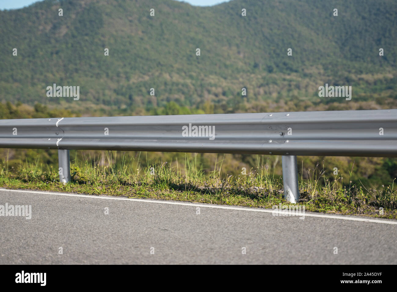 Safety steel barrier on freeway bridge designed to prevent the exit of ...