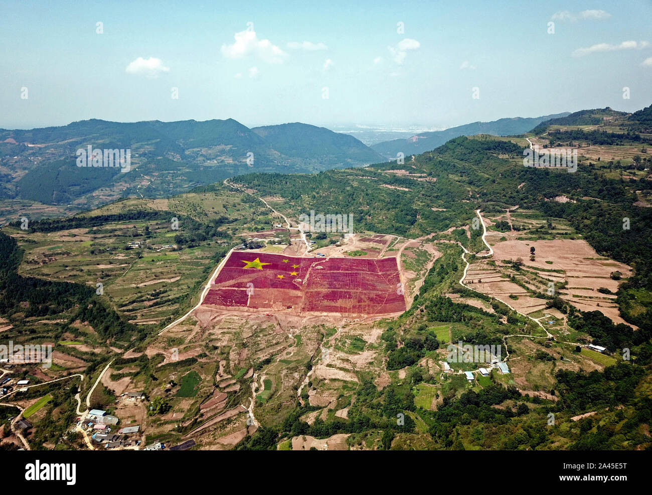An aerial view of the large national flag of 125 acres compsed by ...