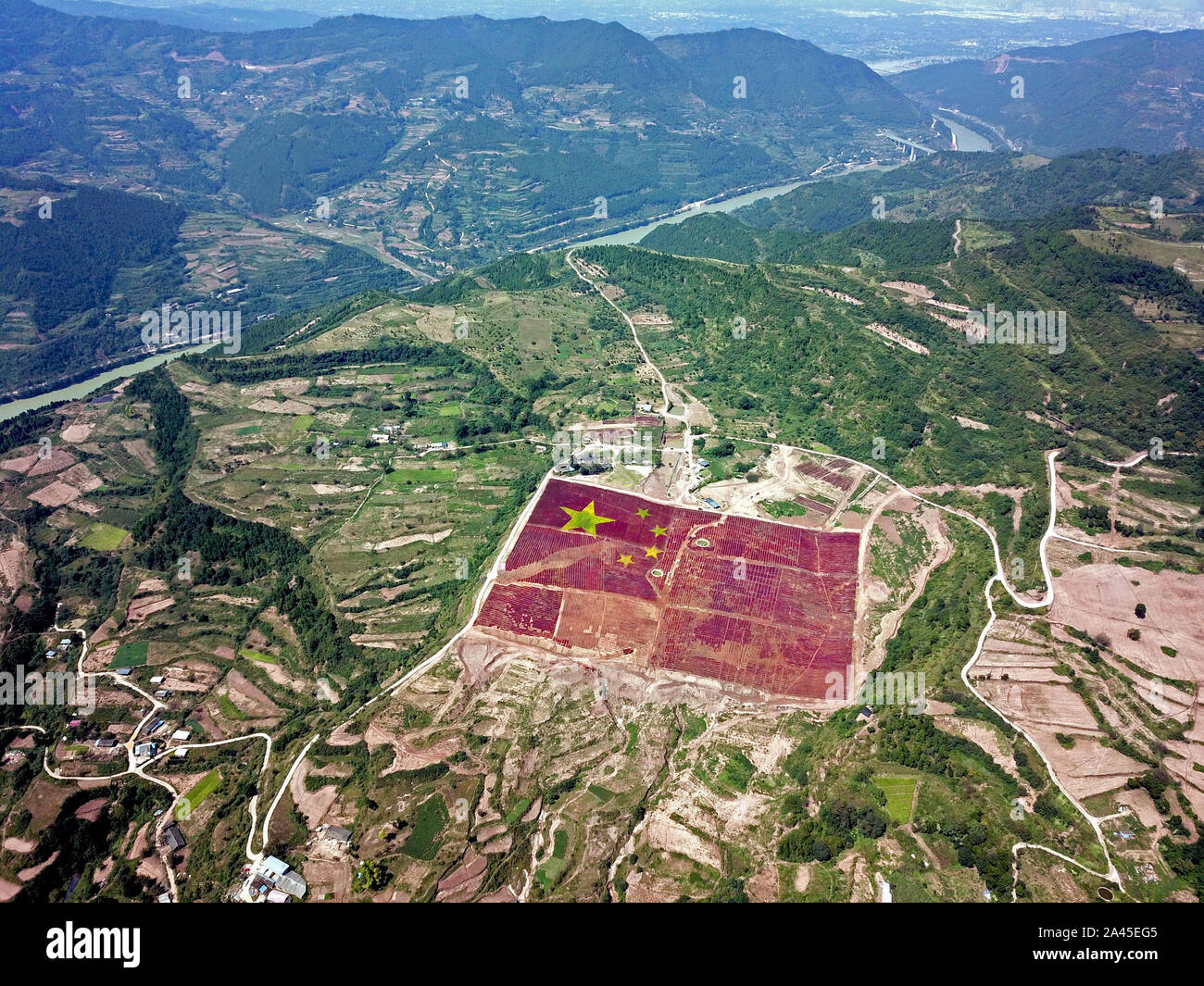 An aerial view of the large national flag of 125 acres compsed by ...