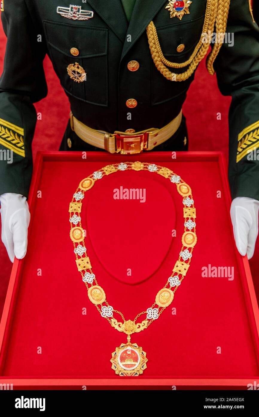 Soldiers present medals at the presentation ceremony of the national ...