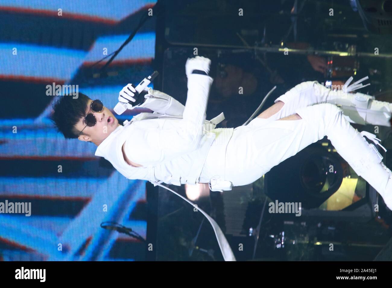 Hong Kong singer Leo Ku Kui Kei appears and sings at a concert of Kenny ...