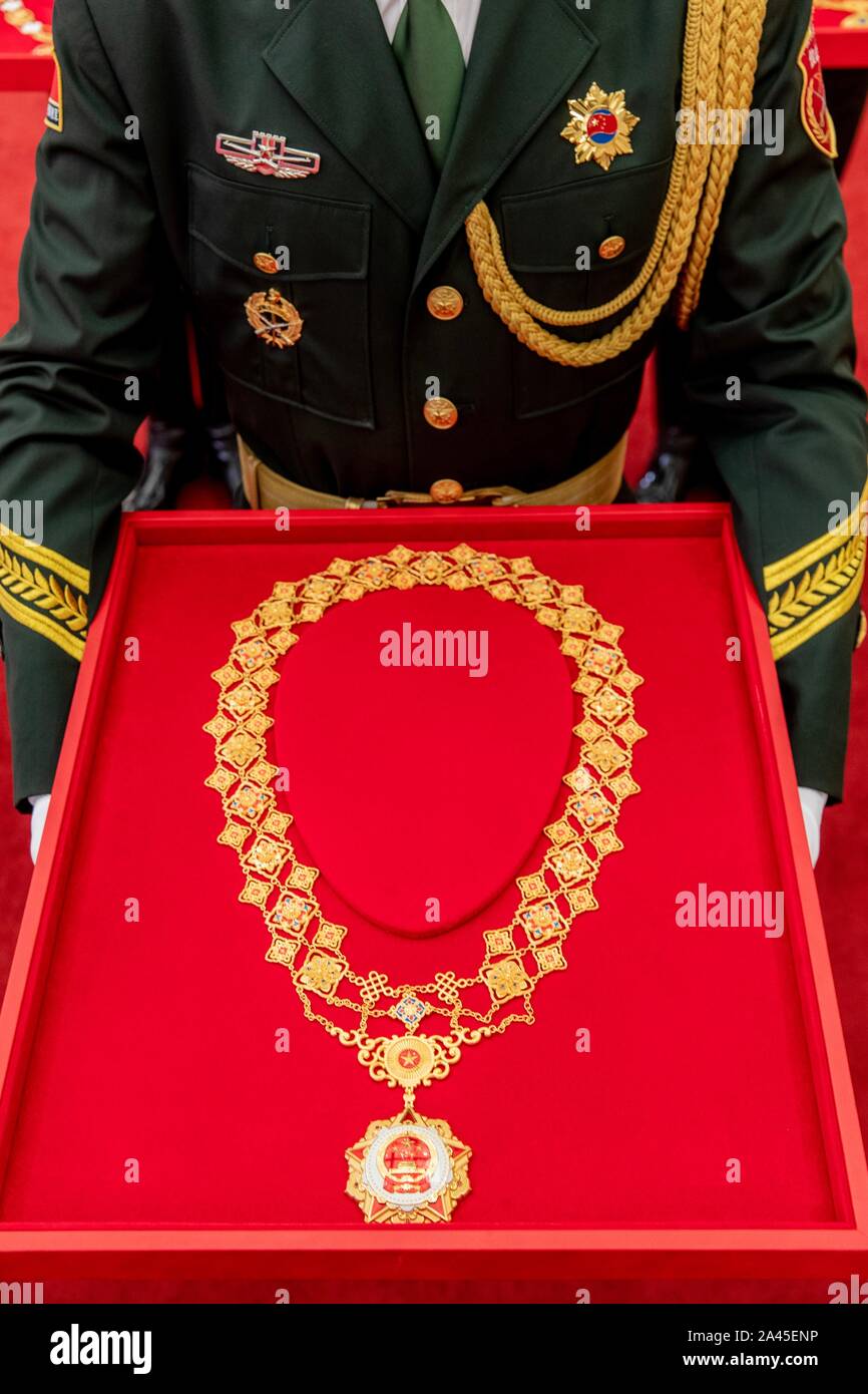 Soldiers present medals at the presentation ceremony of the national ...