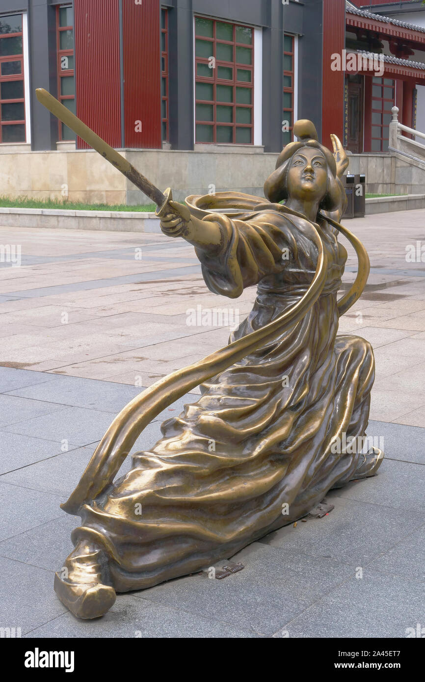 Metal copper statue of woman holding sword posing Chinese Kung Fu ...