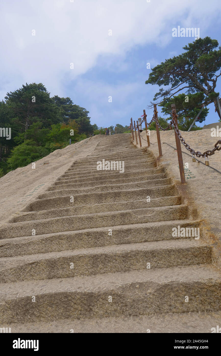 Steep ladder in Sacred taoist mountain Mount Huashan, popular touristic ...