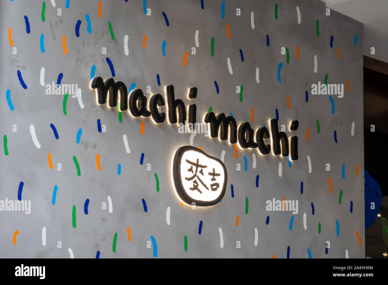 Customers queue up in front of a pop-up store of Machi Machi, which is ...