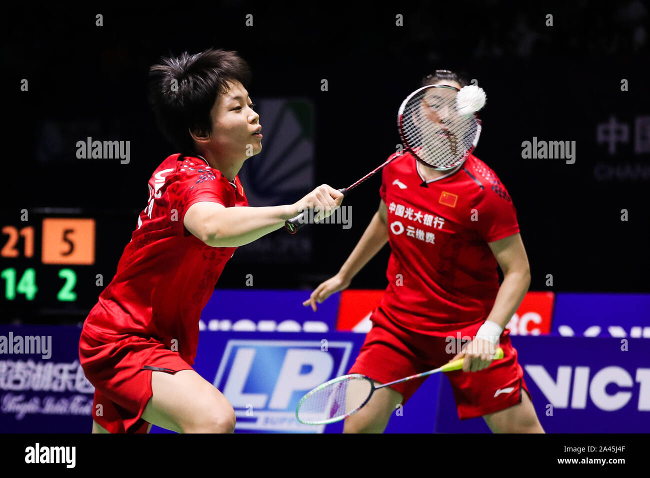 Chinese professional badminton players Jia Yifan and Chen Qingchen compete against Japanese ...