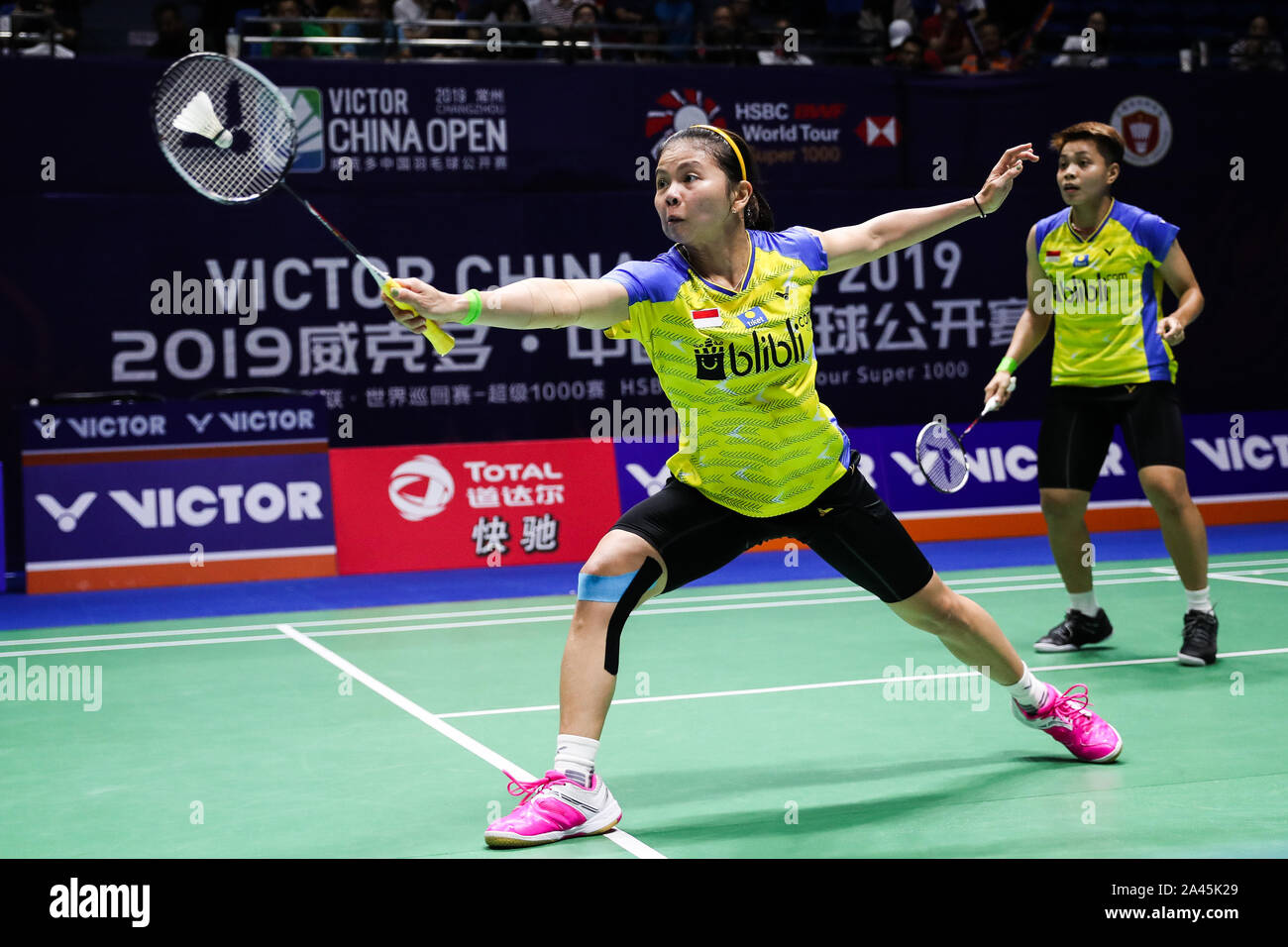 Greysia Polii and Apriyani Rahayu of Indonesia get teh ball at the ...