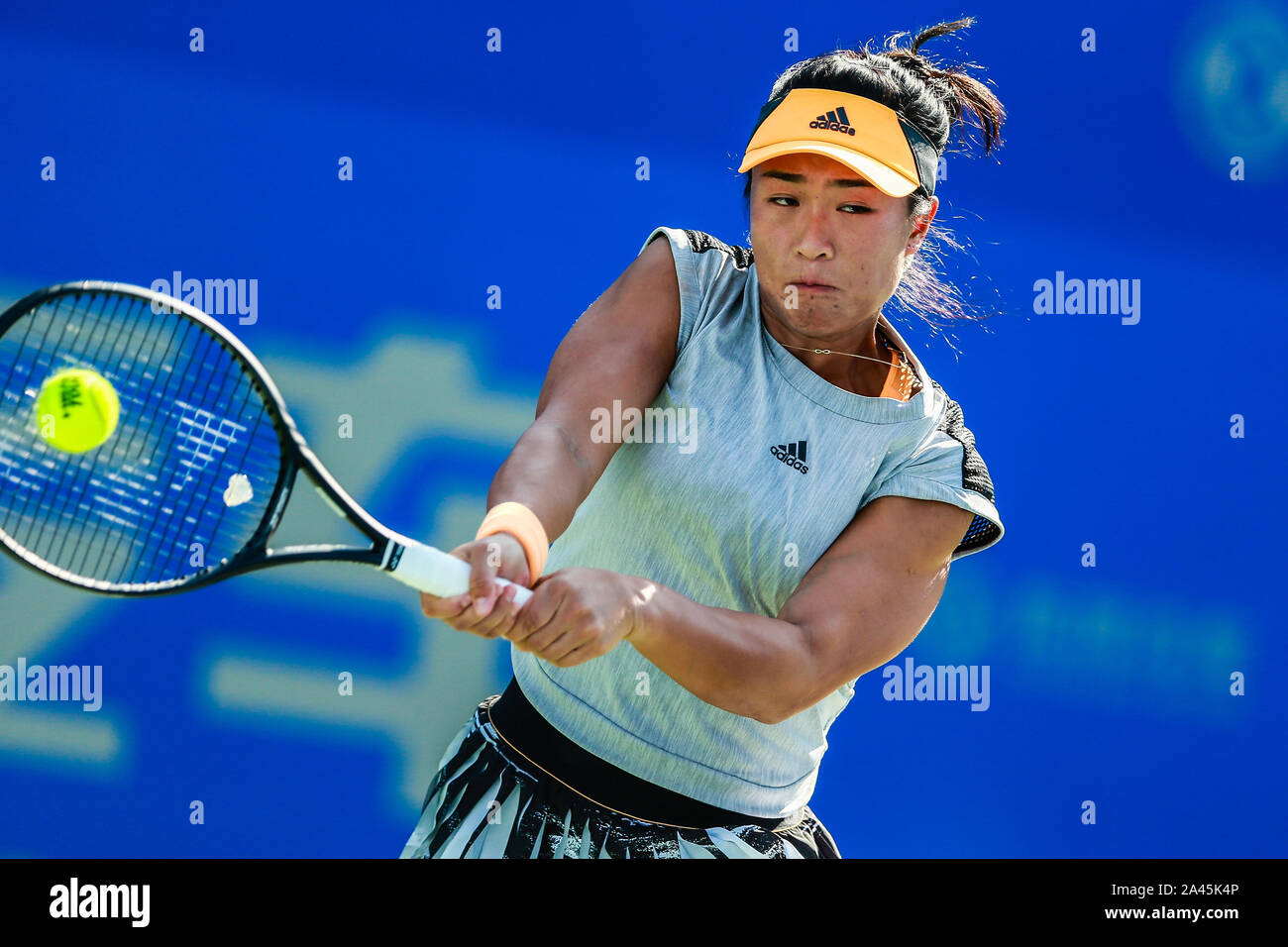 Xinyun Han of China catches the ball against Fiona Ferro of France at ...