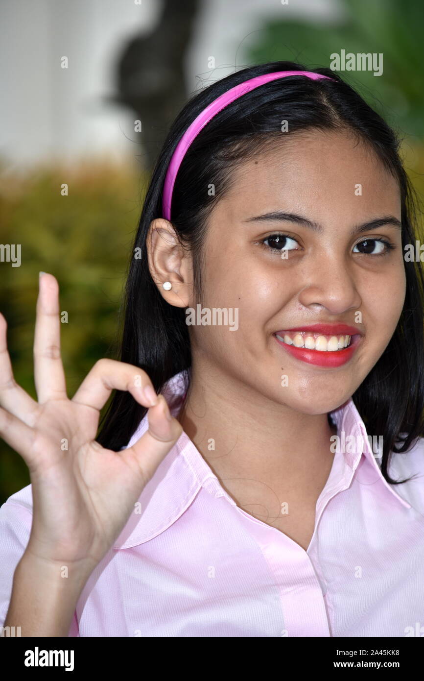 Girl And Okay Sign Stock Photo - Alamy
