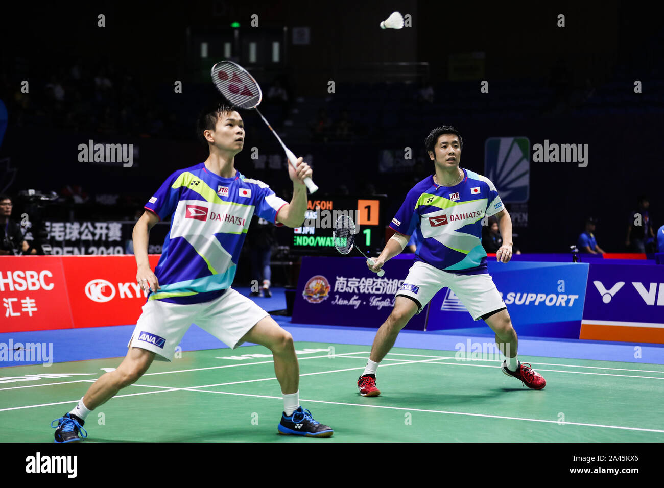 Japanese professional badminton players Hiroyuki Endo and Yuta Watanabe ...