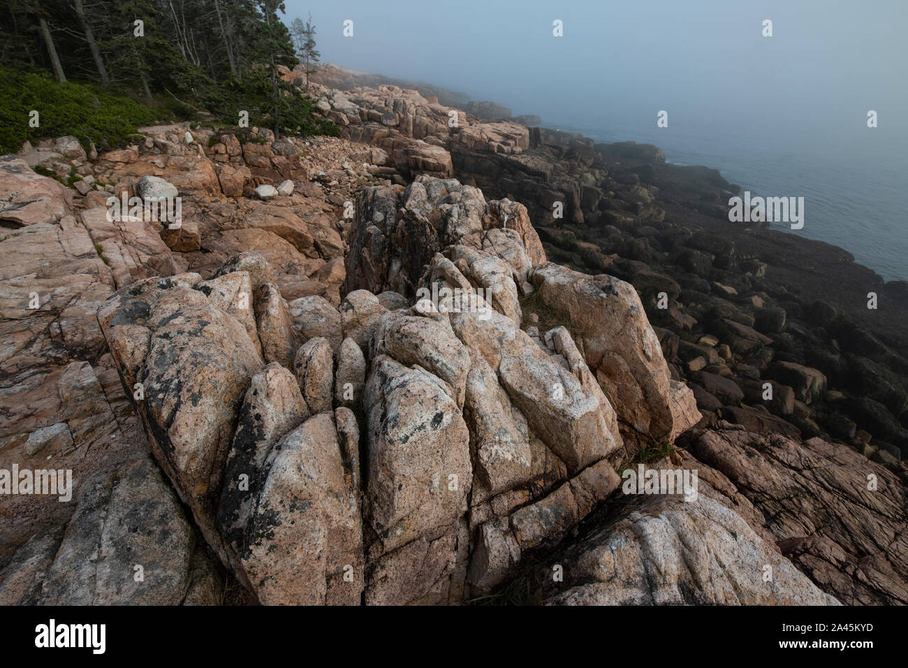 Rocks by ocean Stock Photo - Alamy