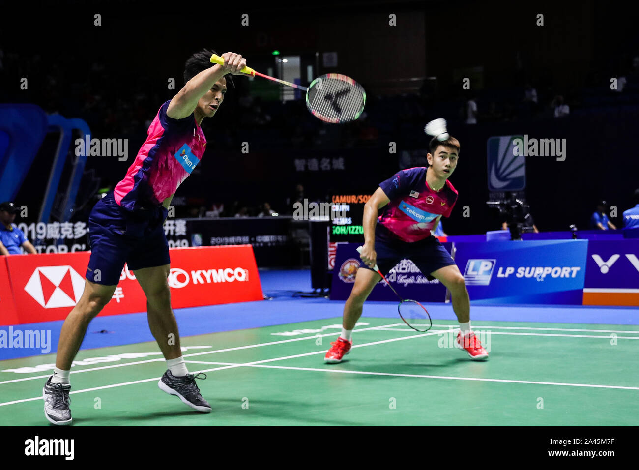 Malaysian professional badminton players Goh Sze Fei and Nur Izzuddin ...