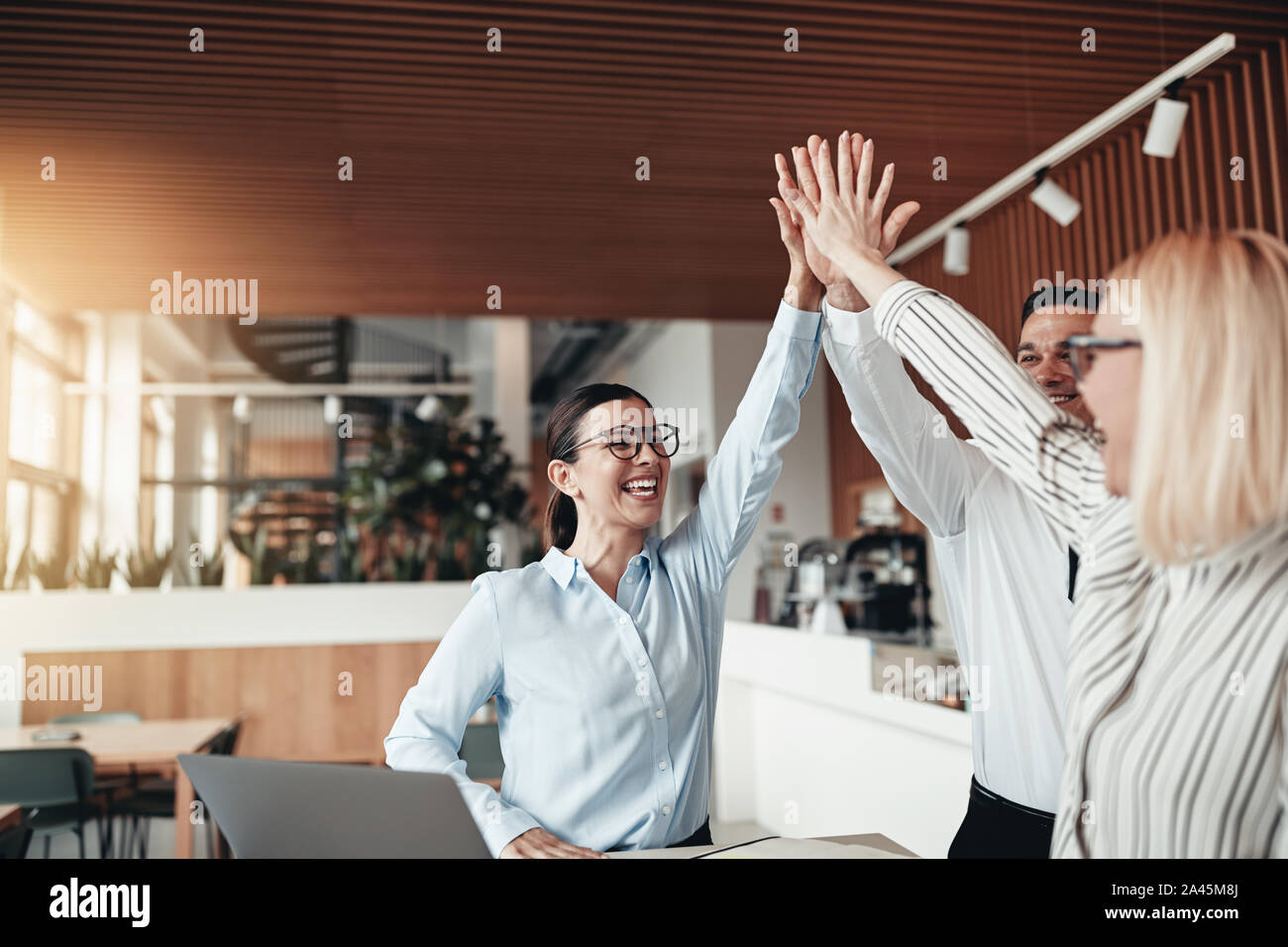 Girls High Fiving High Resolution Stock Photography and Images - Alamy