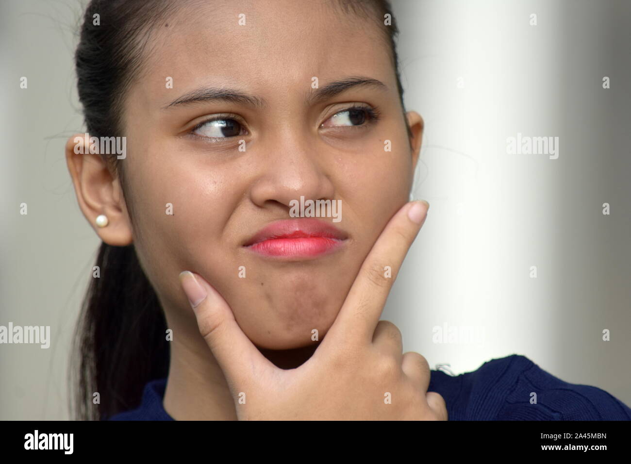 Teenage Female Making A Decision Stock Photo - Alamy