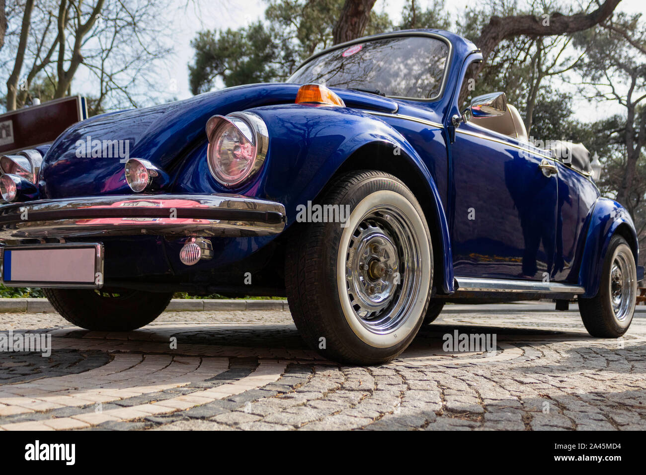 Front-left side view of navy blue classic convertible car Stock Photo ...
