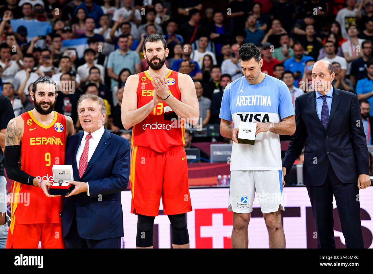Spanish professional basketball player Ricky Rubio, left, is announced ...