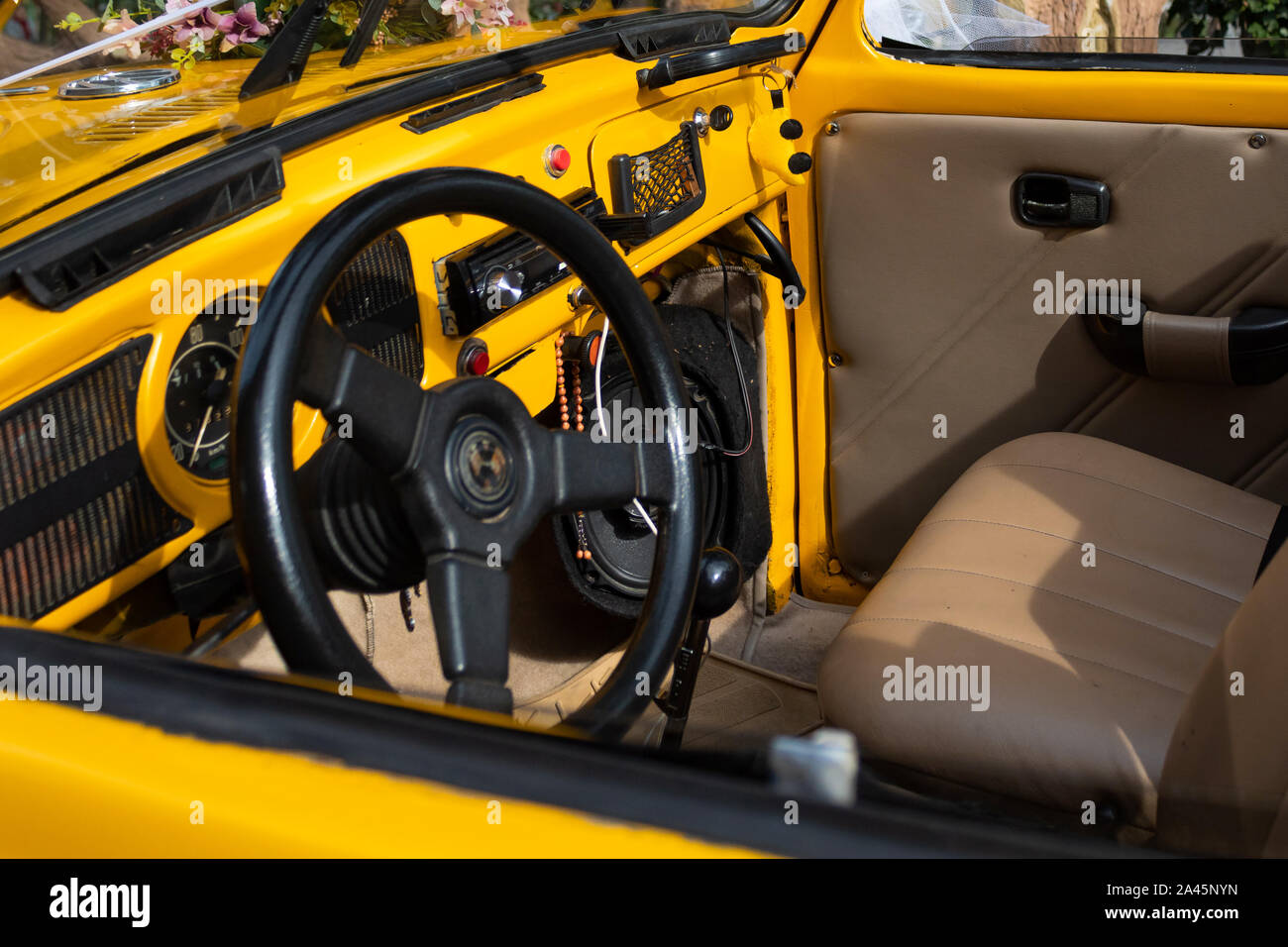 İnterior view of convertible old yellow car Stock Photo - Alamy