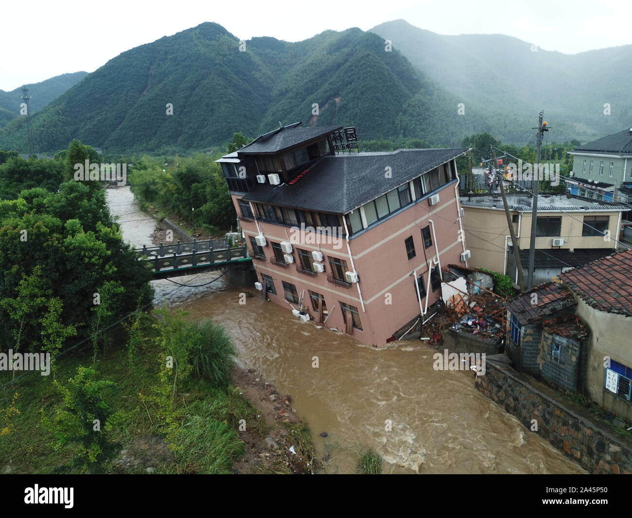 A house's first floor sinks into water due to heavy rainstorm caused by ...