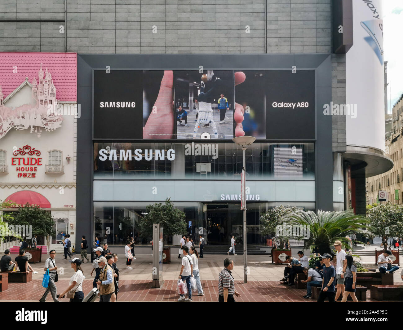 Outside view of the new Samsung experience store, in front of an Apple ...