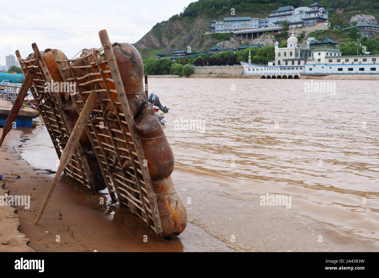 Sheepskin raft by the Yellow River in Lanzhou Gansu China Stock Photo ...