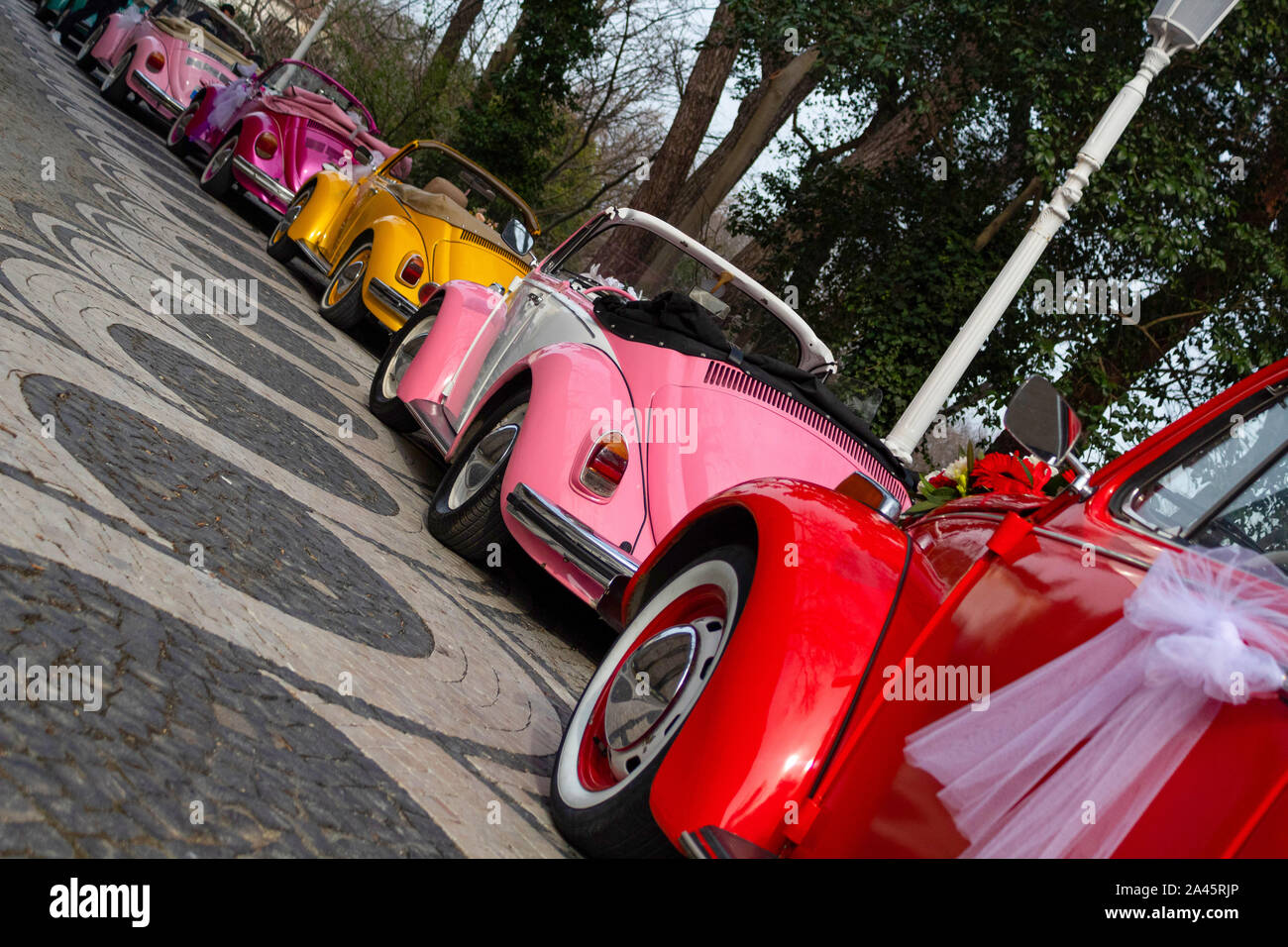 Colorful classic car queue Stock Photo - Alamy