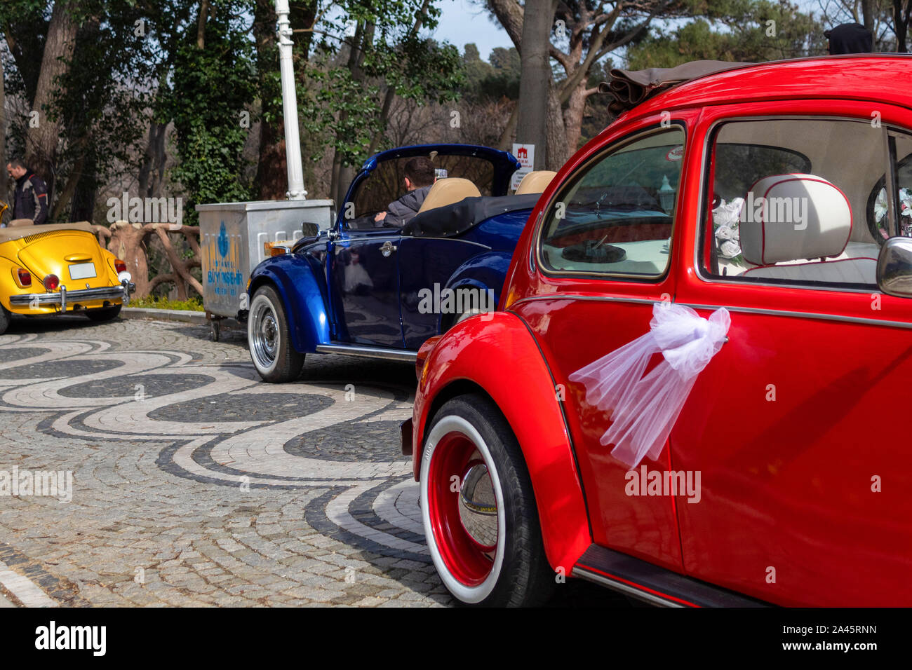 Colorful classic car queue Stock Photo - Alamy