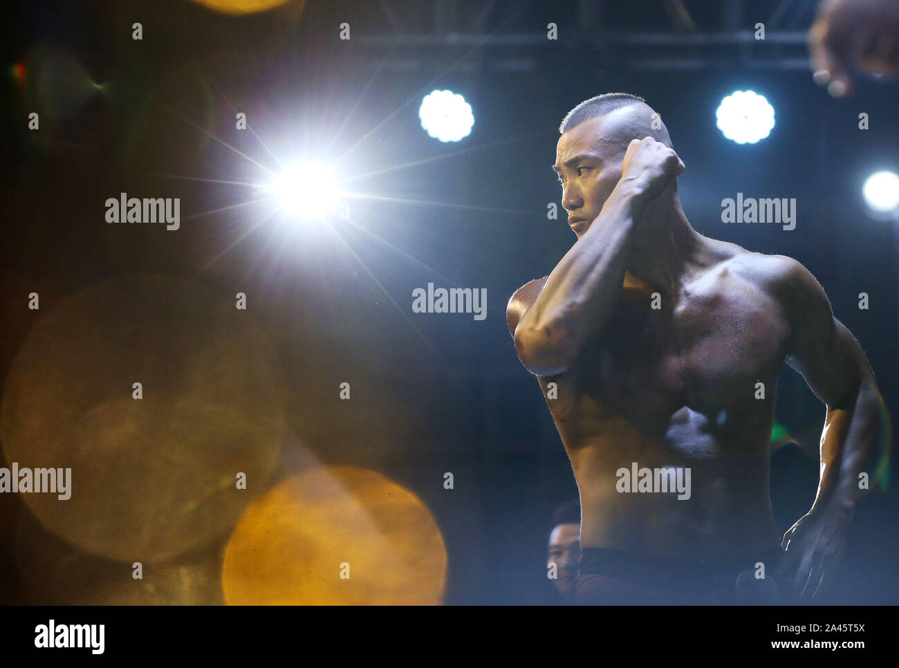 A man shows off muscles and bodies on the stage at the 2019 ...
