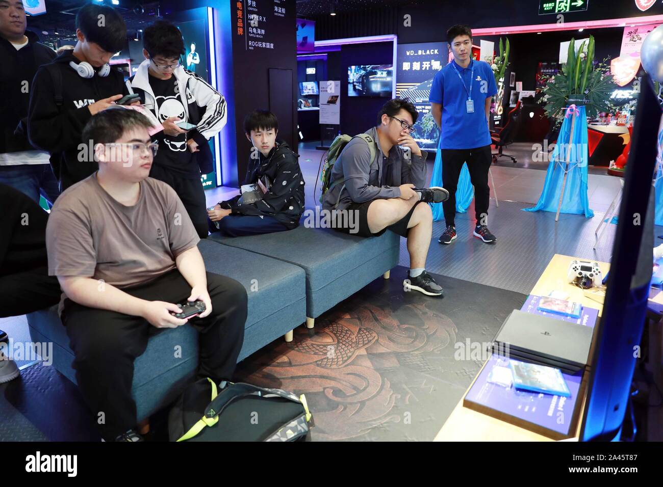 Locals experience PlayStation, a video gaming brand that consists of ...