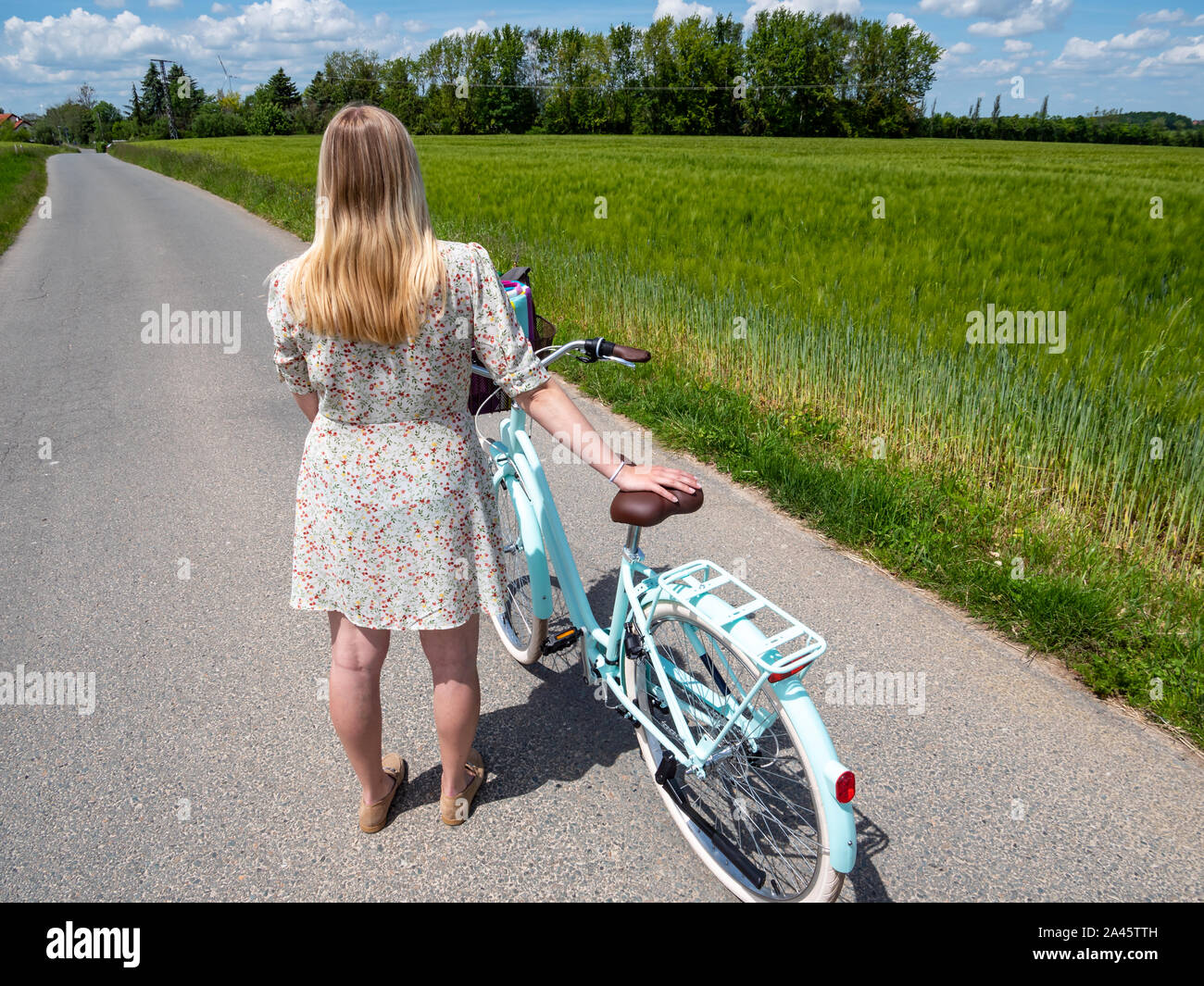 Woman spring bike blonde hi-res stock photography and images - Alamy