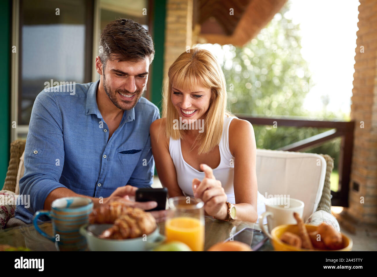 Couple breakfast terrace hi-res stock photography and images - Alamy