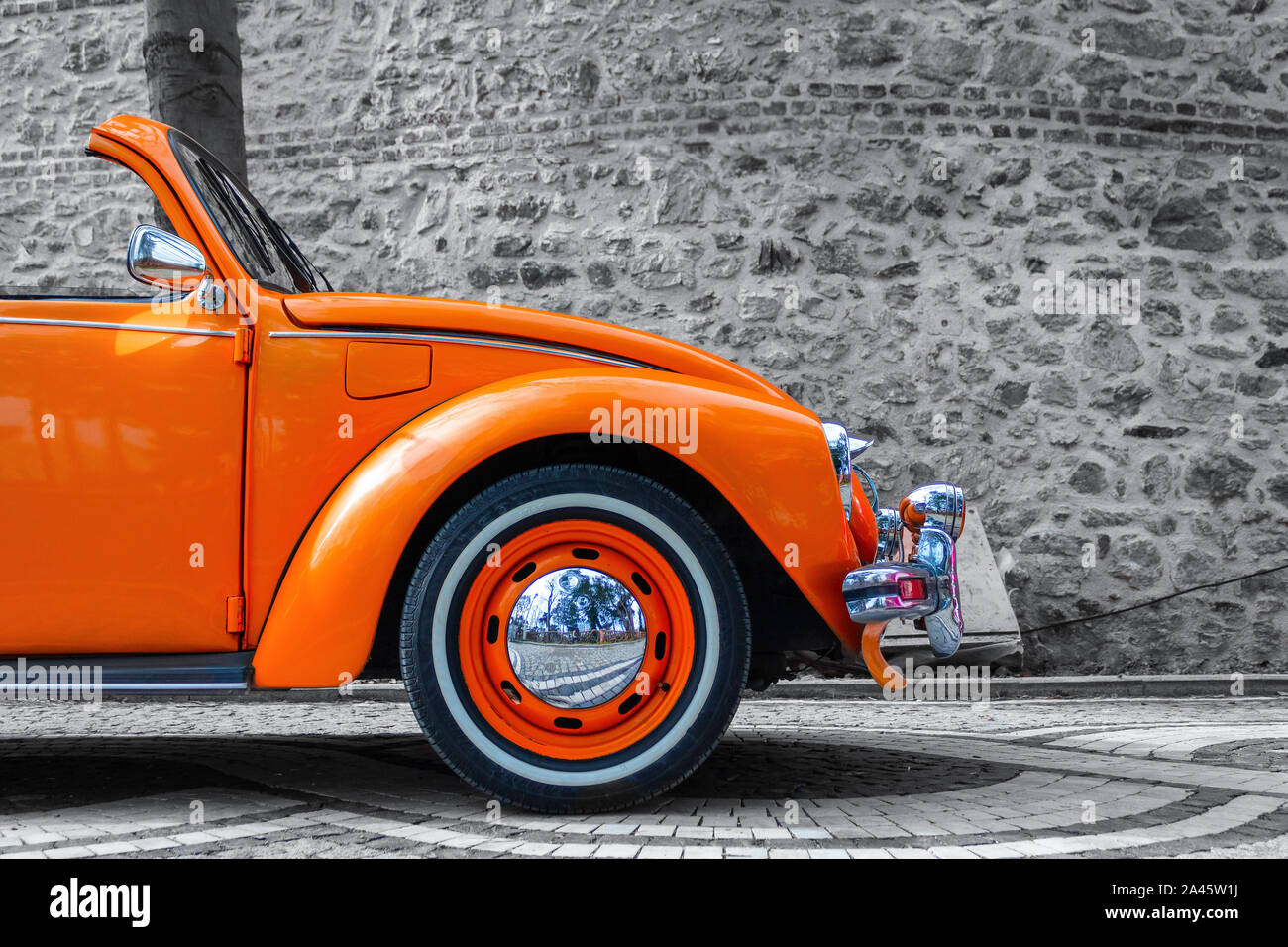 Right perspective view of orange convertible classic car Stock Photo ...