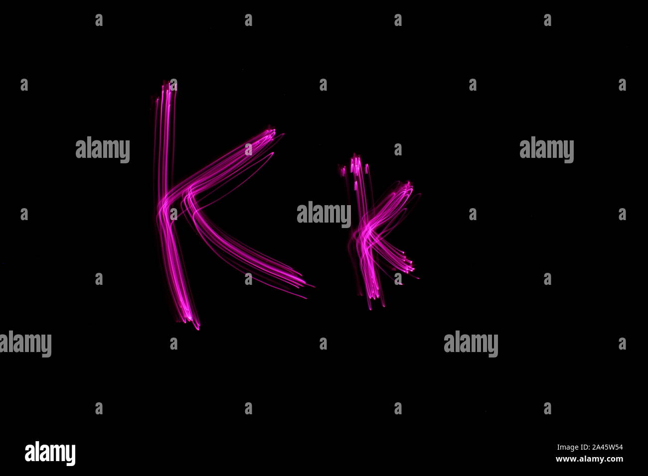 Long exposure photograph of the letter k in upper and lower case in ...
