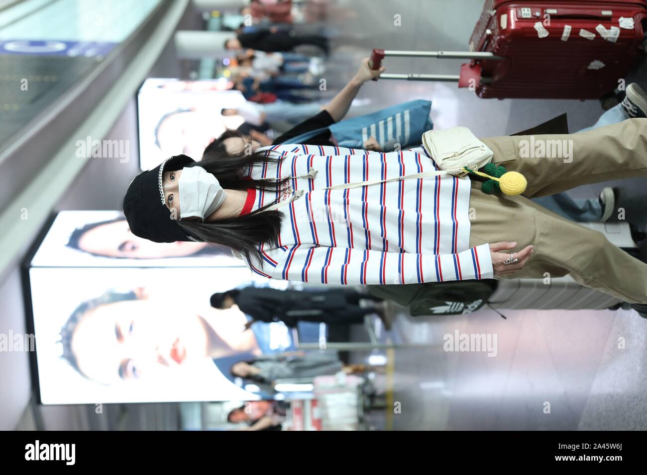 Chinese singer Zhang Bichen or Diamond Zhang arrives at the Beijing ...